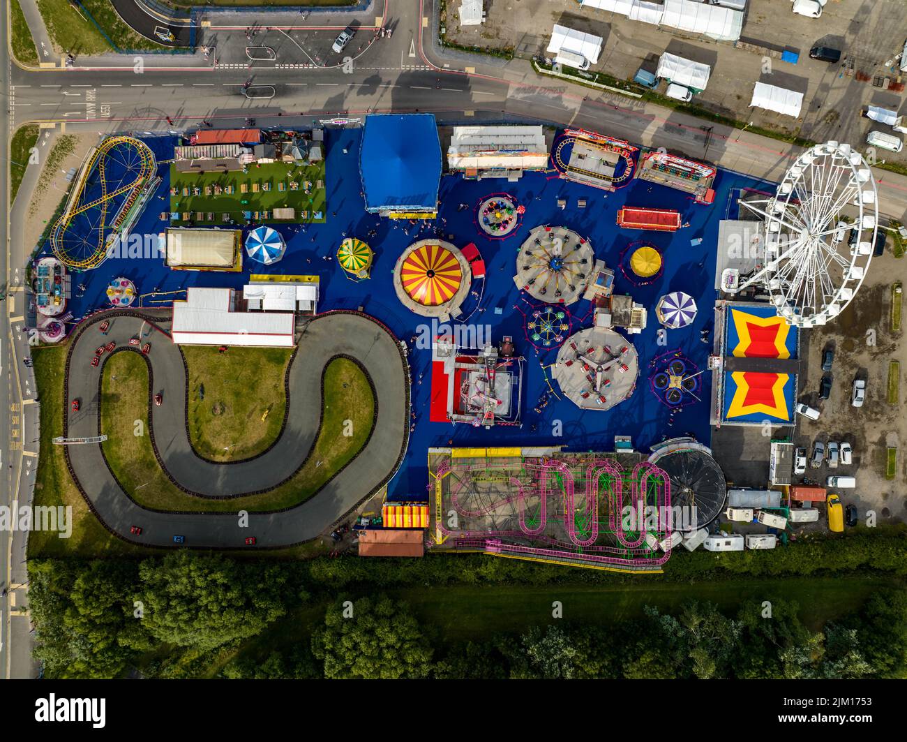 Colorful funfair at Towyn North Wales From the air, Aerial Drone, Birds ...