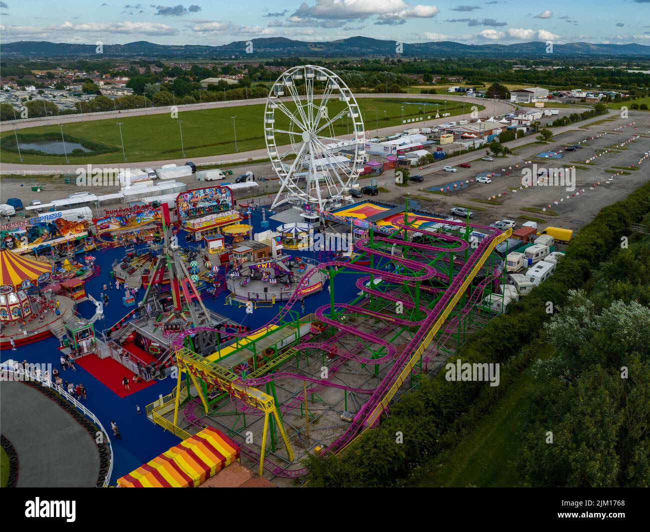Colorful funfair at Towyn North Wales From the air, Aerial Drone, Birds Eye View , Inc the ...