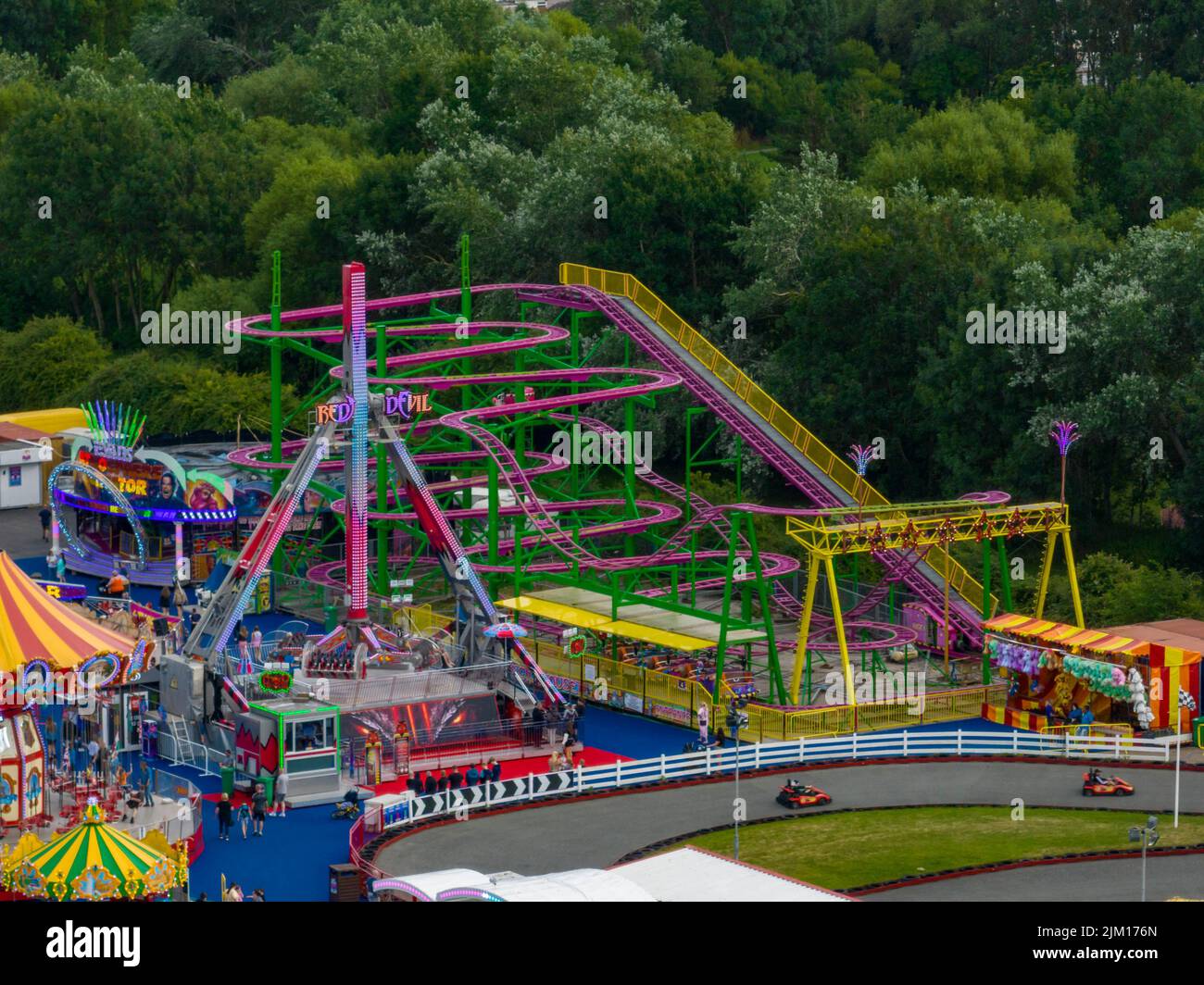 Colorful funfair at Towyn North Wales From the air, Aerial Drone, Birds ...