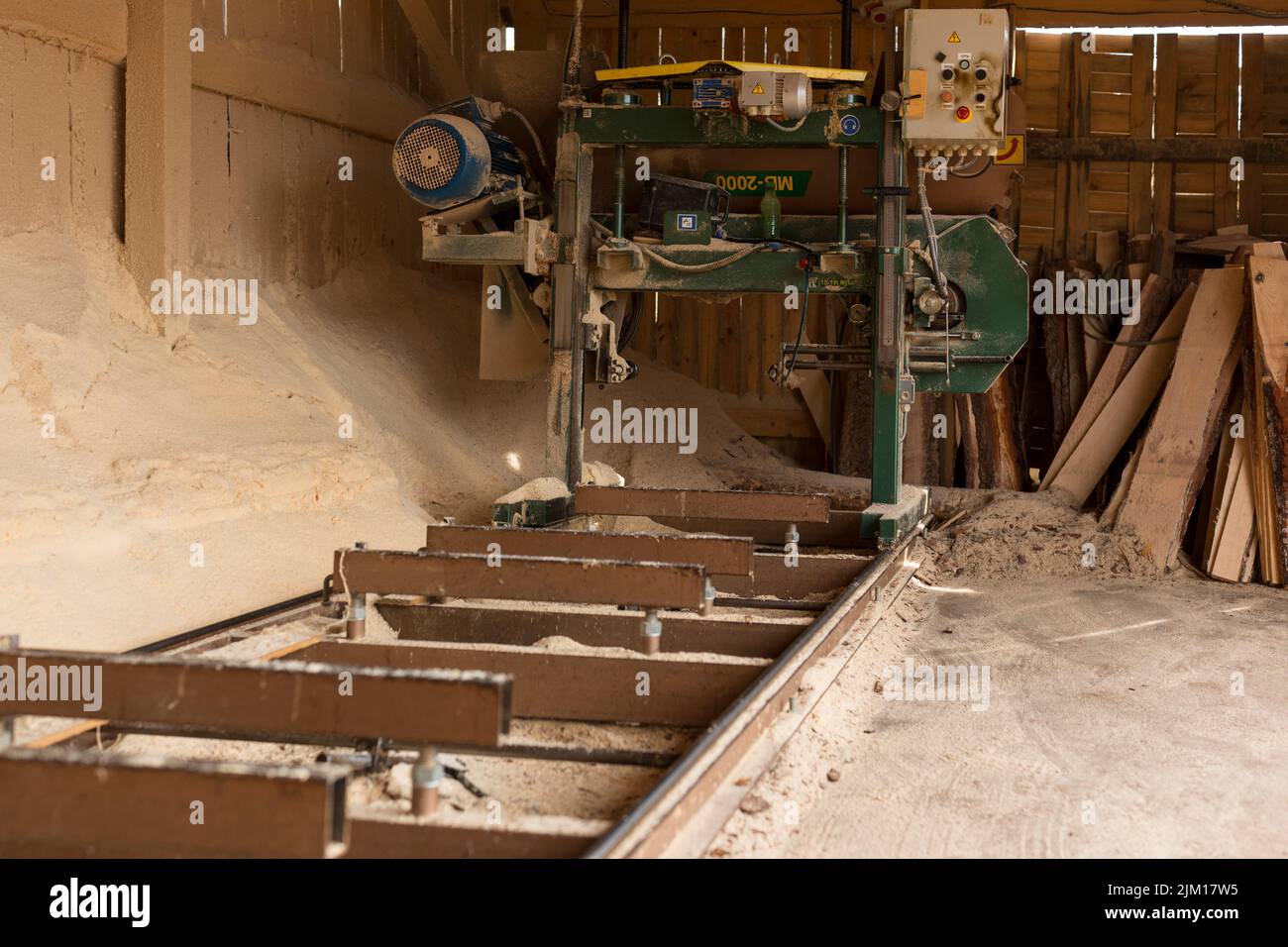 Texture. Woodworking waste. Heaps of chips, bark, pieces and sawdust ...