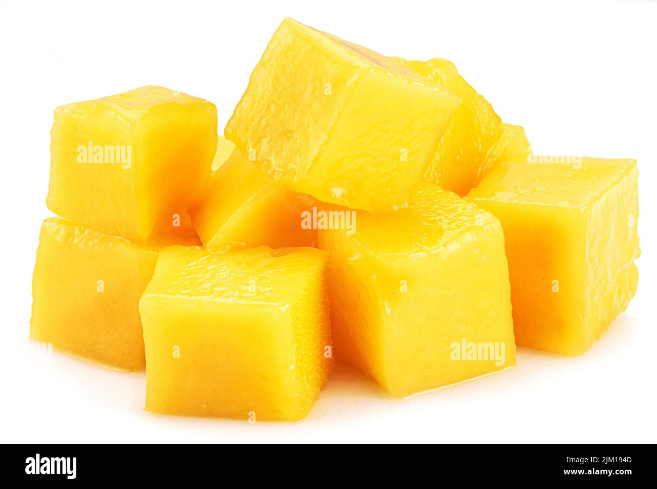 Juicy mango cubes isolated on white background Stock Photo - Alamy