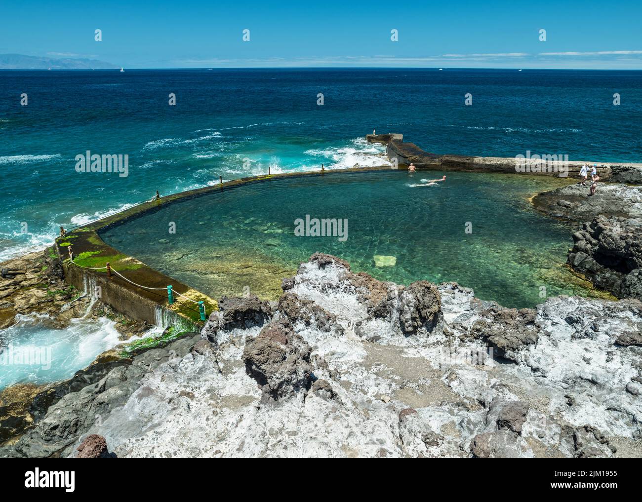Rocky coastline with natural swimming pool of Tenerife Island Stock ...