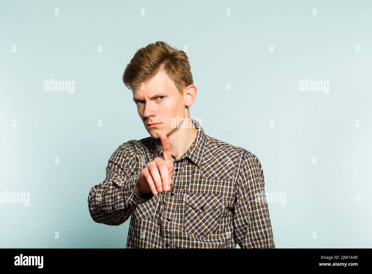 no forbidden don't serious frown man hand gesture Stock Photo - Alamy