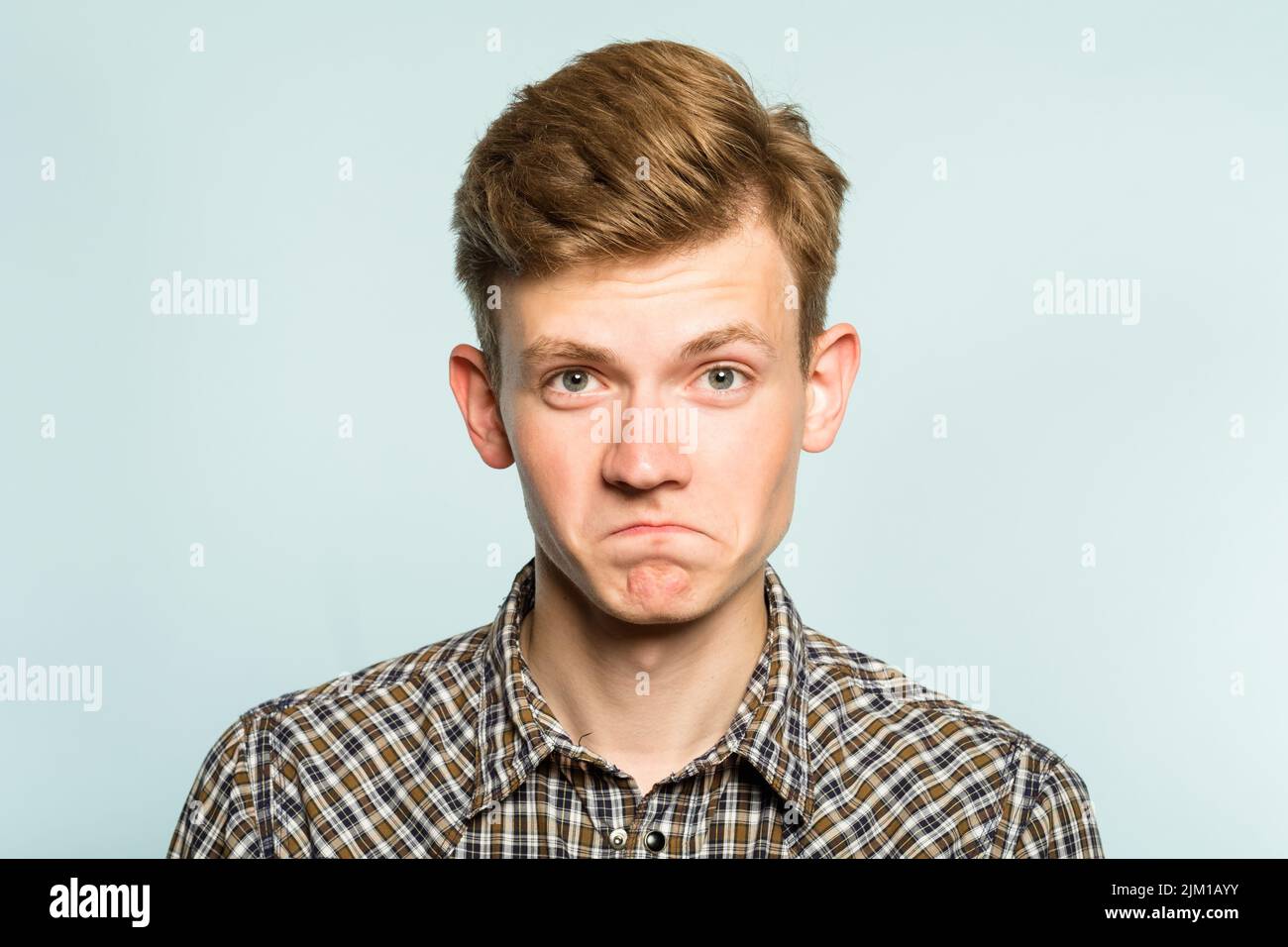 approval judgement accept man facial expression Stock Photo - Alamy