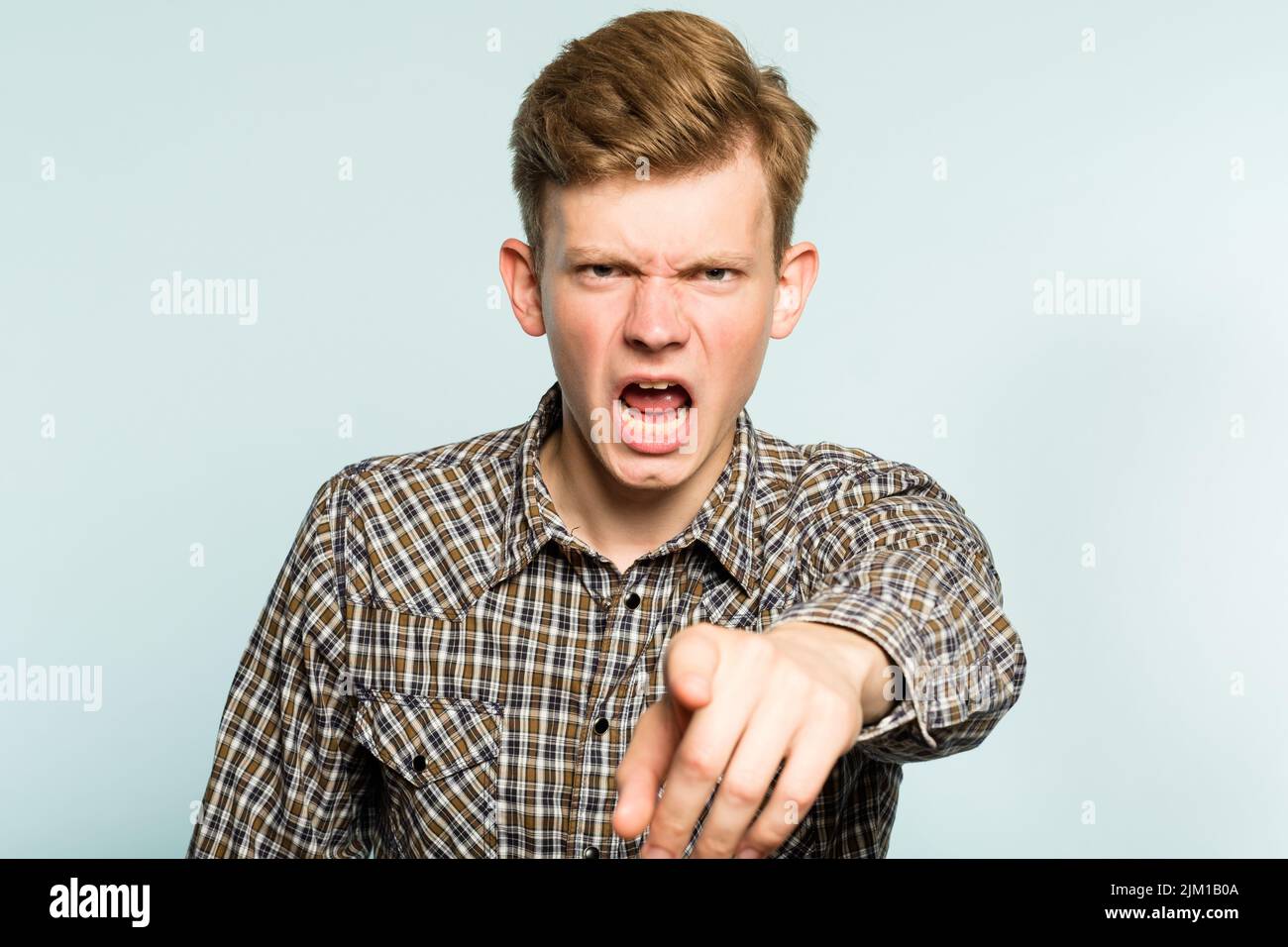 Angry man pointing finger hi-res stock photography and images - Alamy