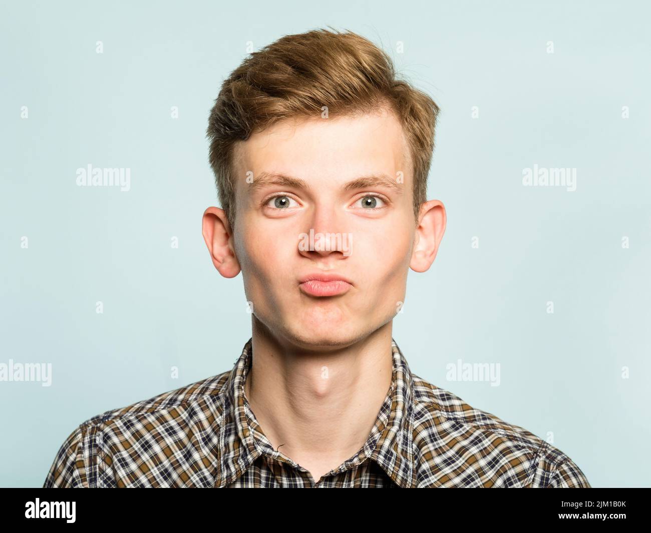 Playful expression hi-res stock photography and images - Alamy