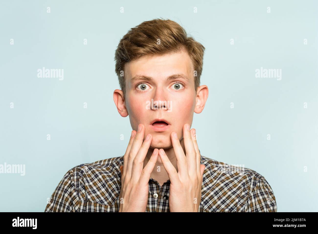 omg unbelievable shock man open mouth emotion Stock Photo - Alamy