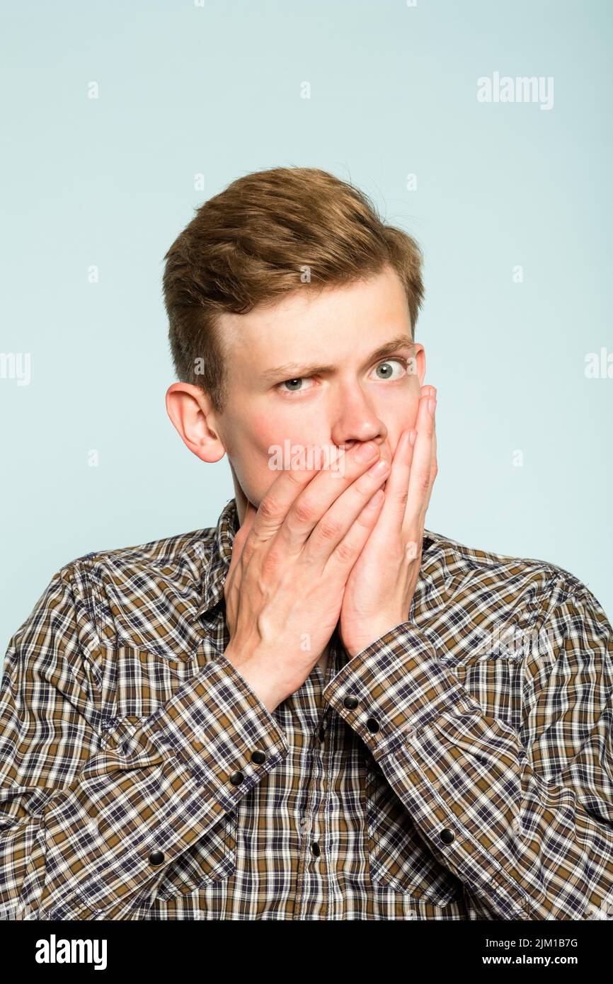 secret mystery man cover mouth hands not speaking Stock Photo - Alamy