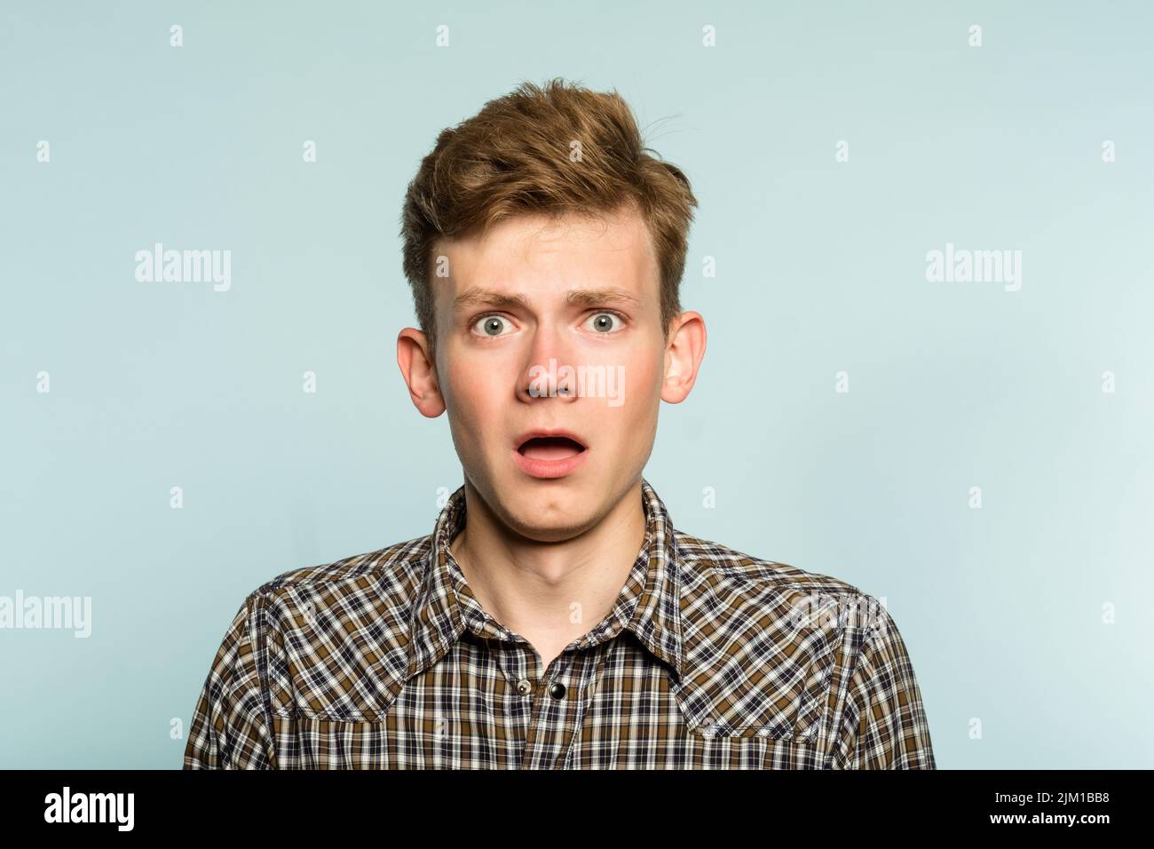 omg unbelievable shock man open mouth emotion Stock Photo - Alamy