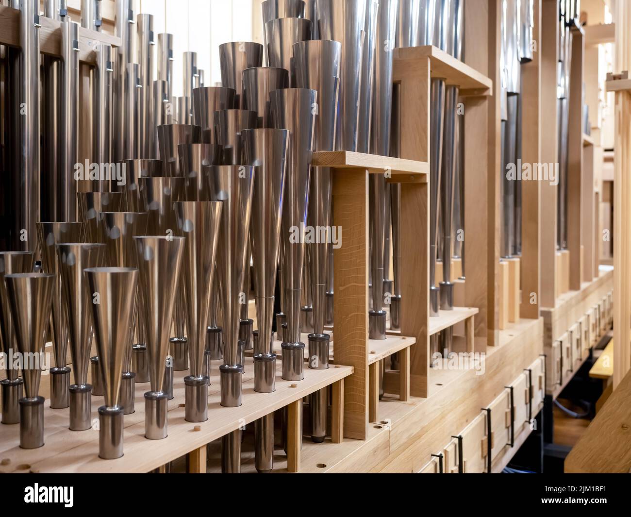 Inside a contemporary organ in modern philharmonic hall, register with ...