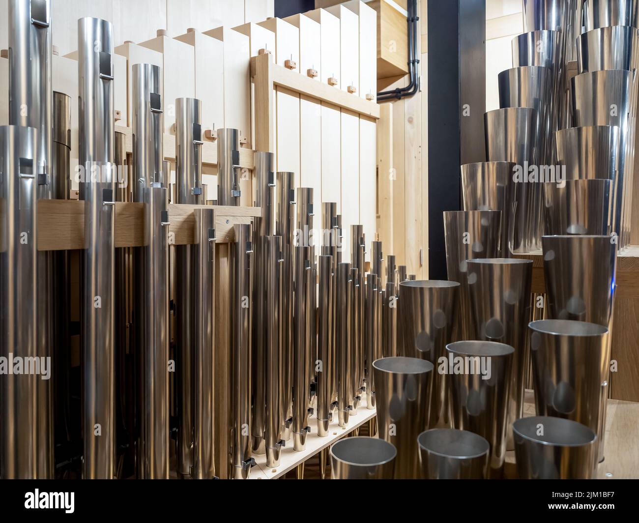 Inside a contemporary organ in modern philharmonic hall, register with ...
