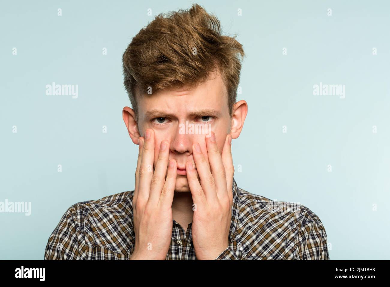 Rueful sorrowful hi-res stock photography and images - Alamy