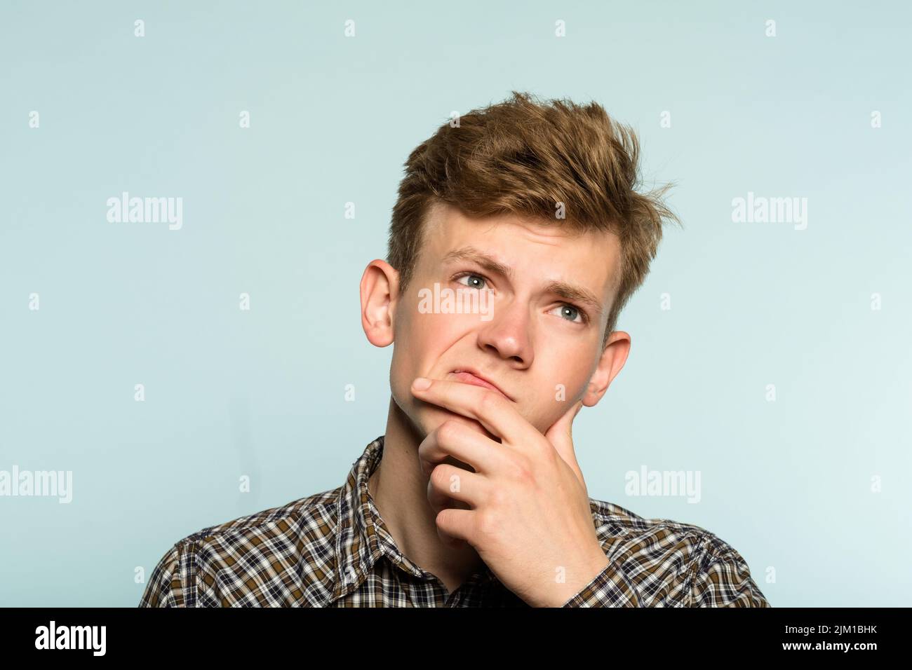 Confused thinking hi-res stock photography and images - Alamy