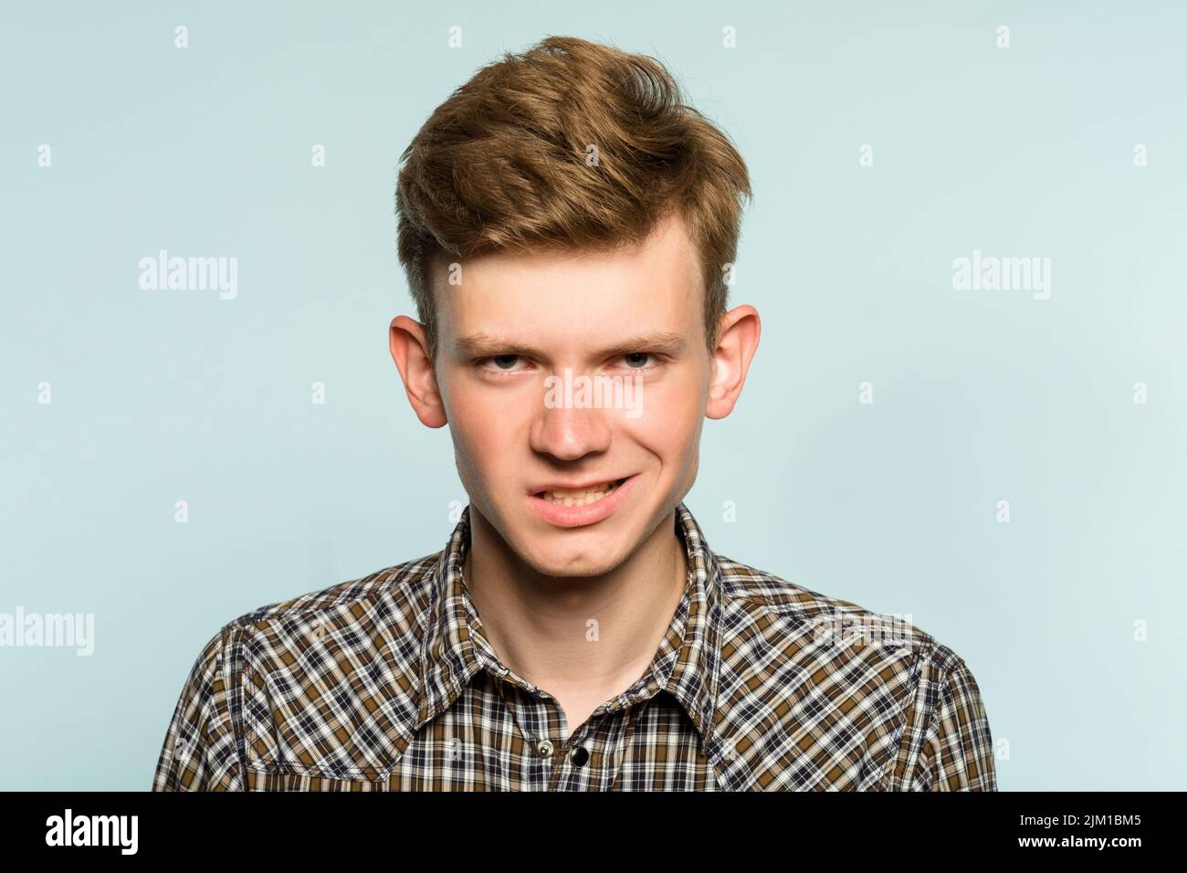 threatening intimidating sneer crazy man smirk Stock Photo - Alamy