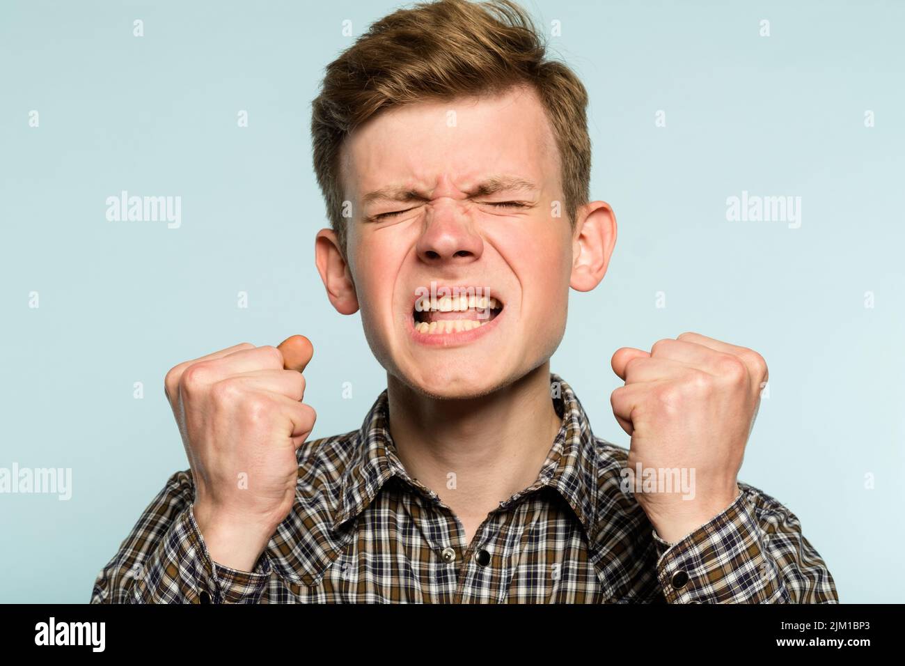 anger rage hatred infuriated man baring teeth Stock Photo - Alamy