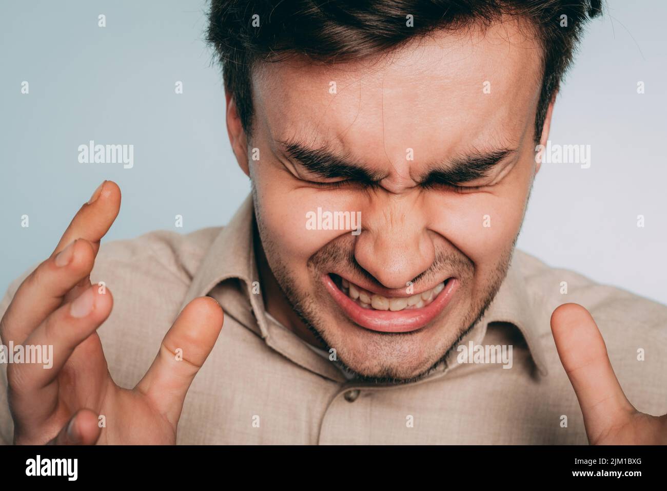 emotional breakdown distress angry man rage agony Stock Photo - Alamy