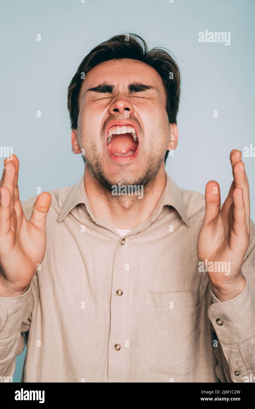 pain agony torment emotional stress man scream Stock Photo - Alamy