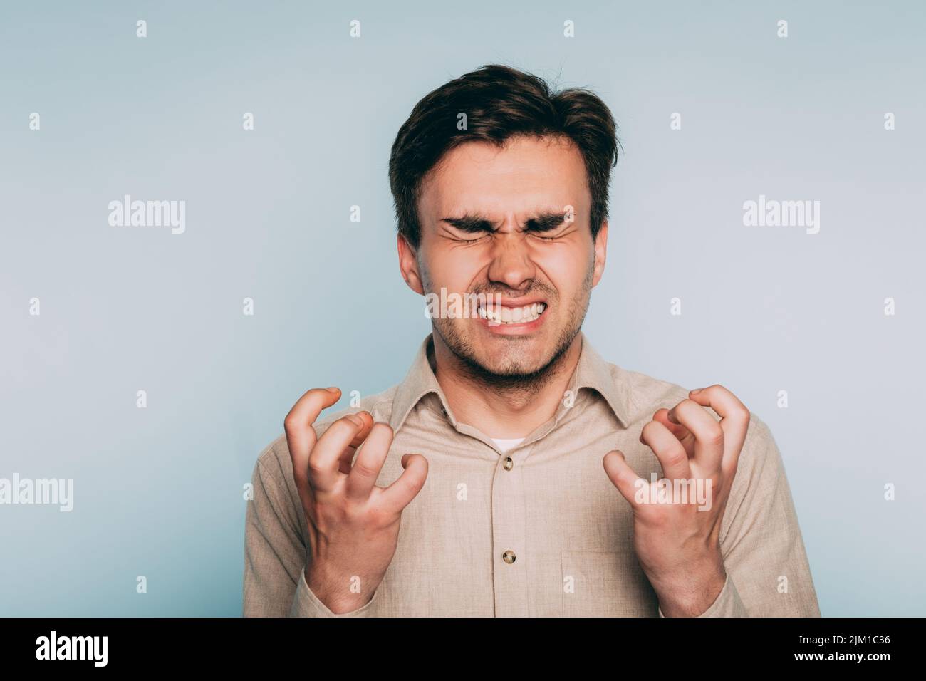anger rage hatred infuriated man baring teeth Stock Photo - Alamy