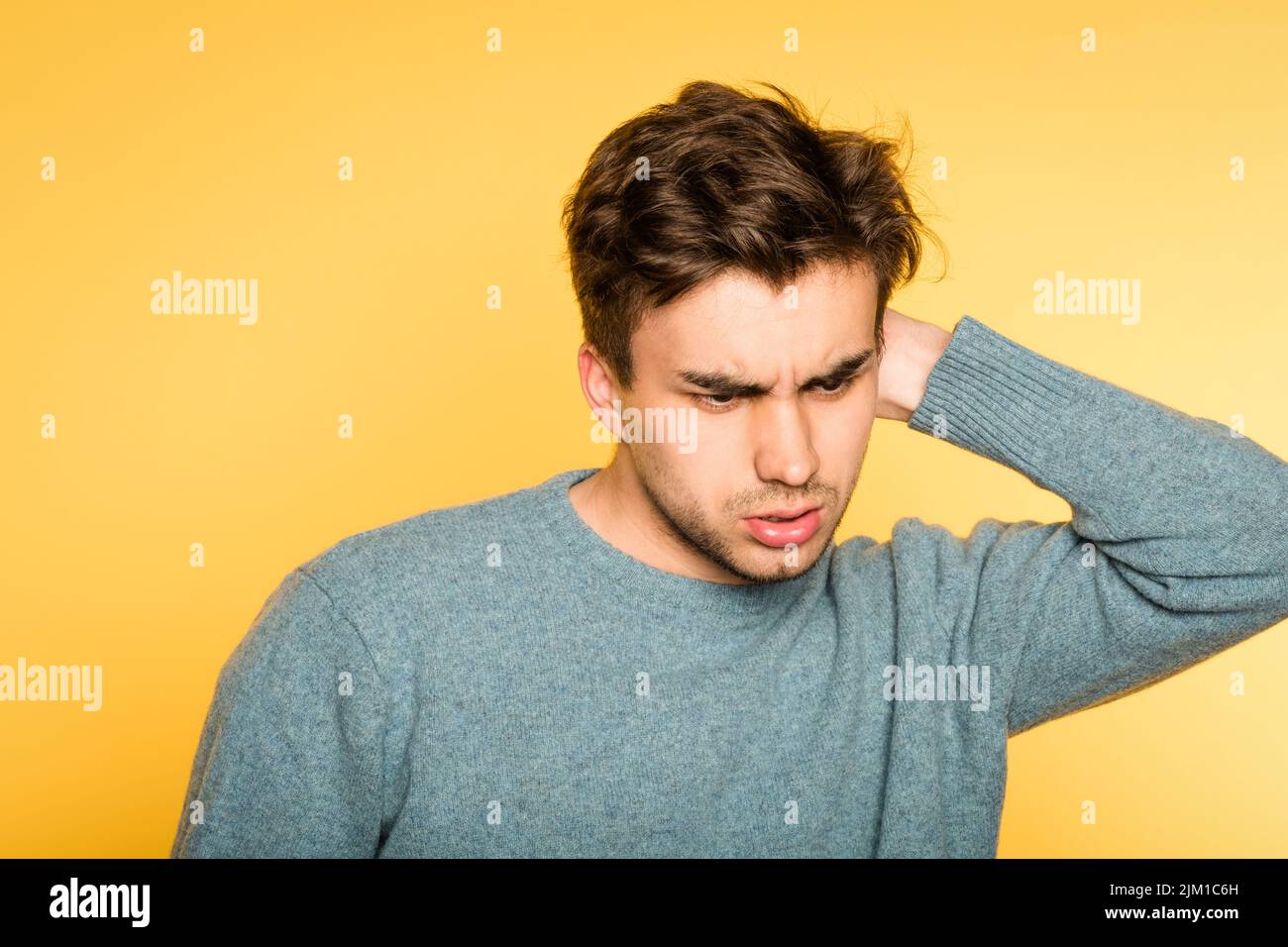 Portrait unshaven perplexed man hi-res stock photography and images - Alamy