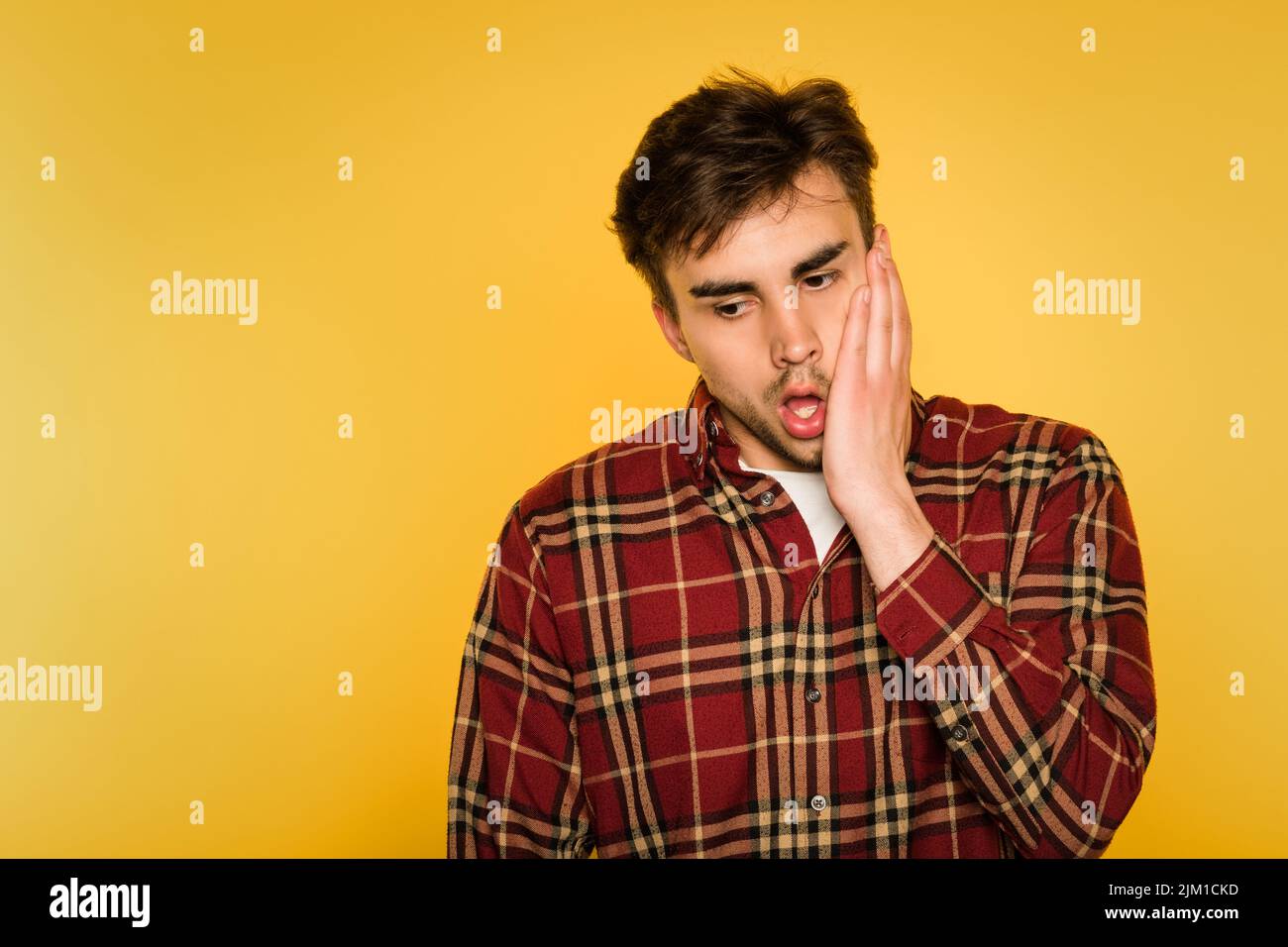 shocked gobsmacked stressed man clutch face emotion Stock Photo - Alamy