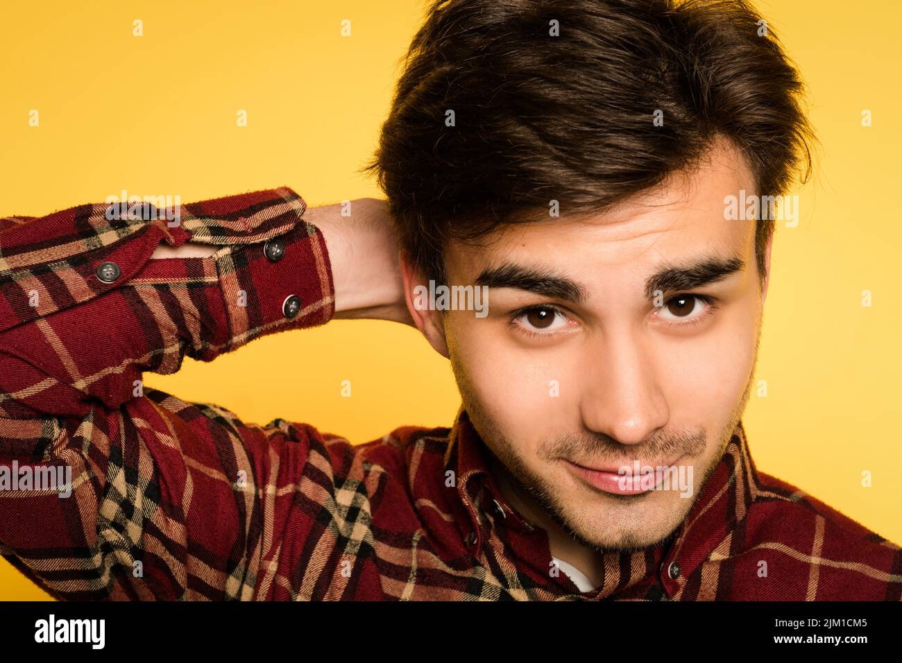 self confident man flirty playful smile emotion Stock Photo - Alamy