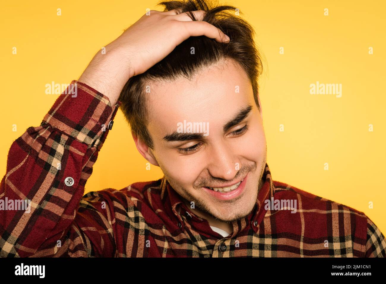 smiling happy relaxed man emotion look sideways Stock Photo - Alamy