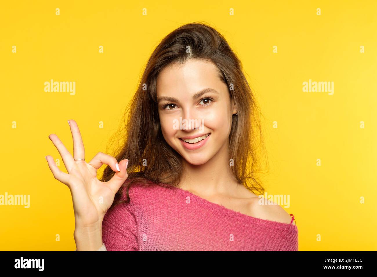 ok gesture expression happy smiling joyful girl Stock Photo - Alamy