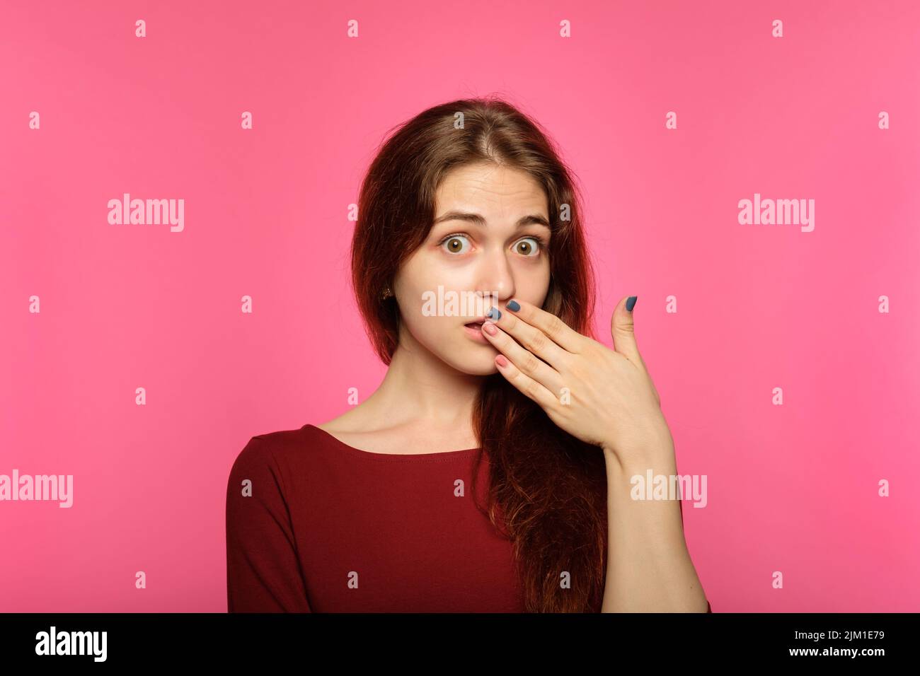 Caucasian girl covering her mouth hi-res stock photography and images ...