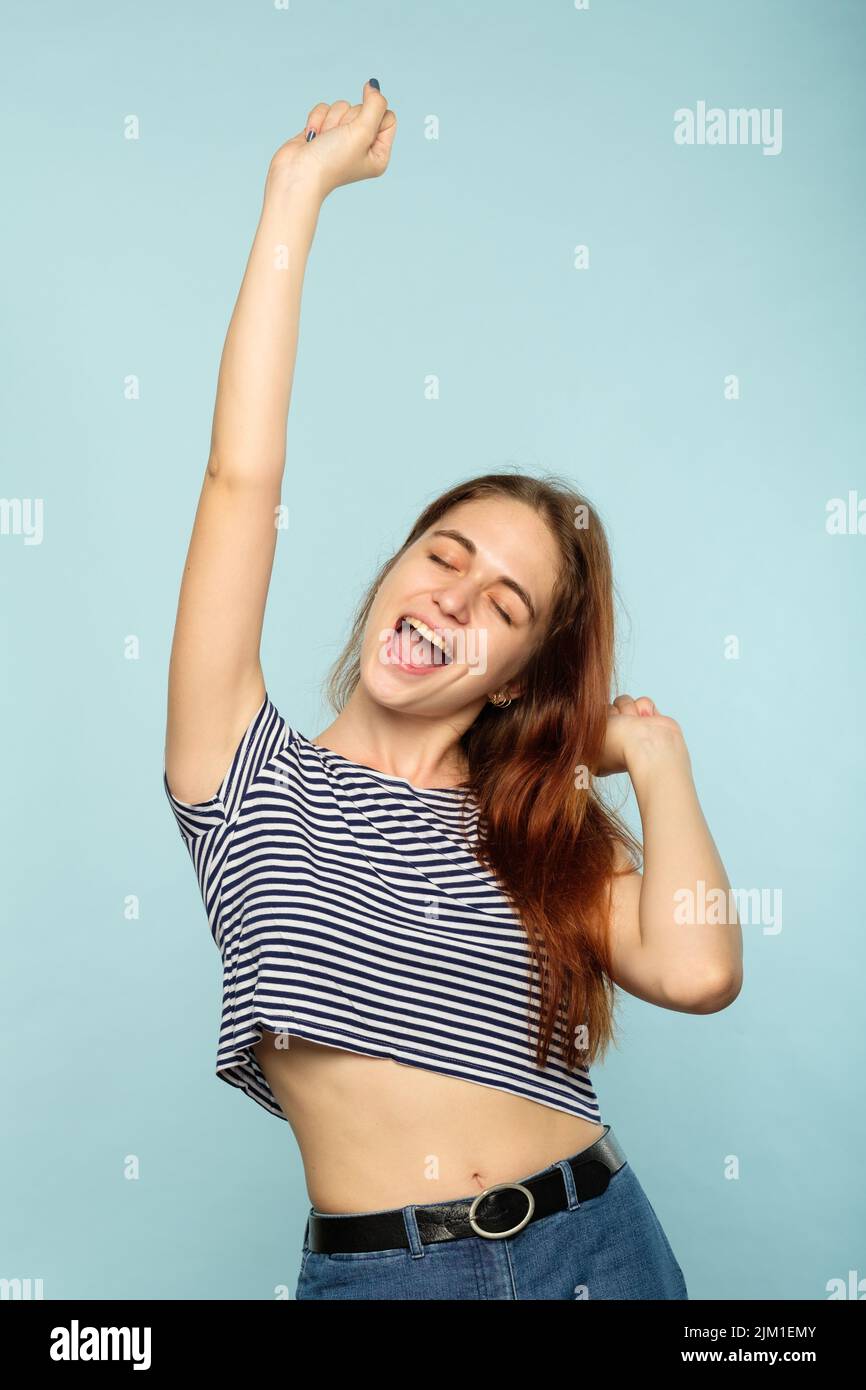 victory success happy joyful girl win gesture hand Stock Photo - Alamy