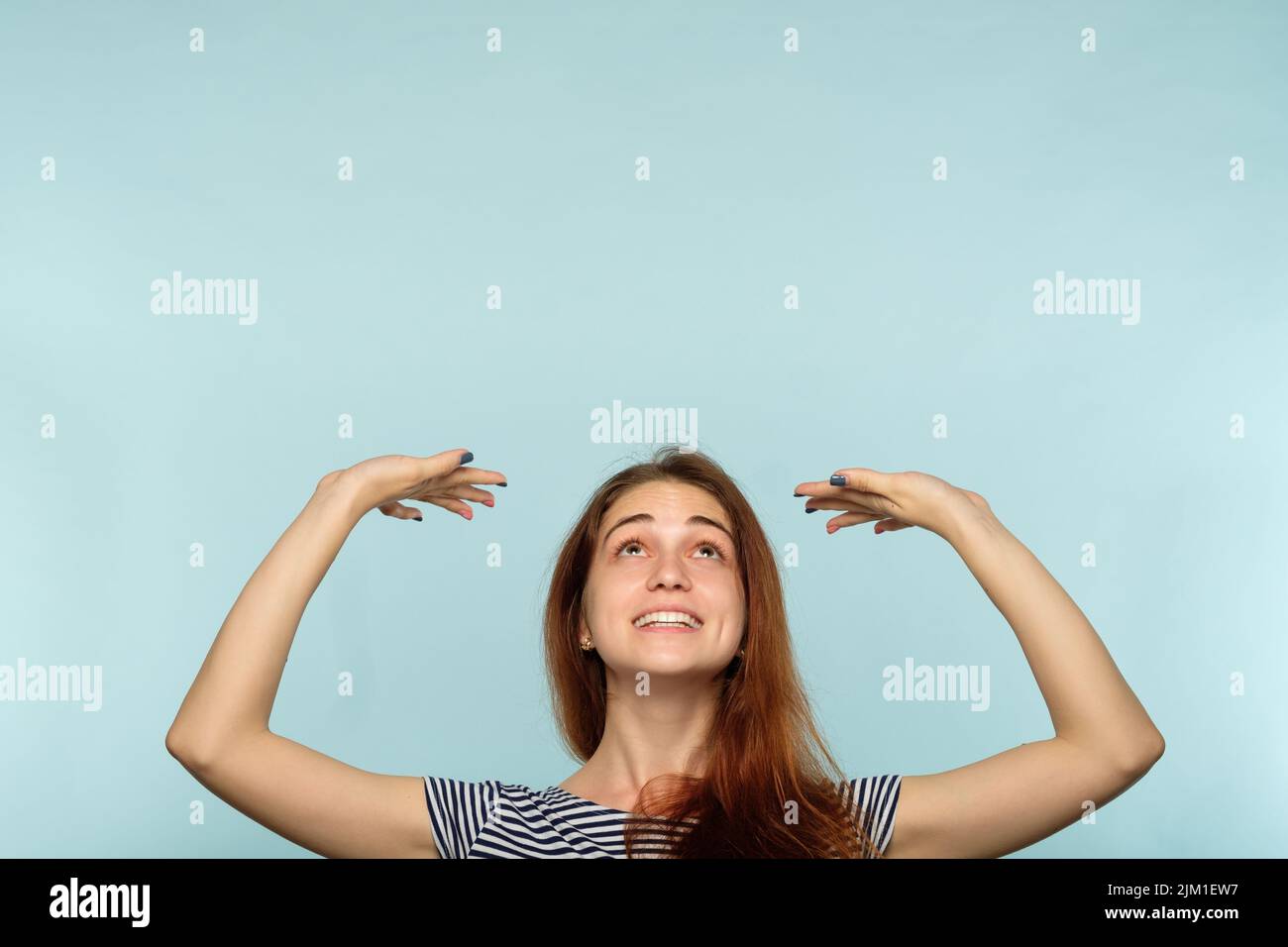 Hands above head hi-res stock photography and images - Alamy