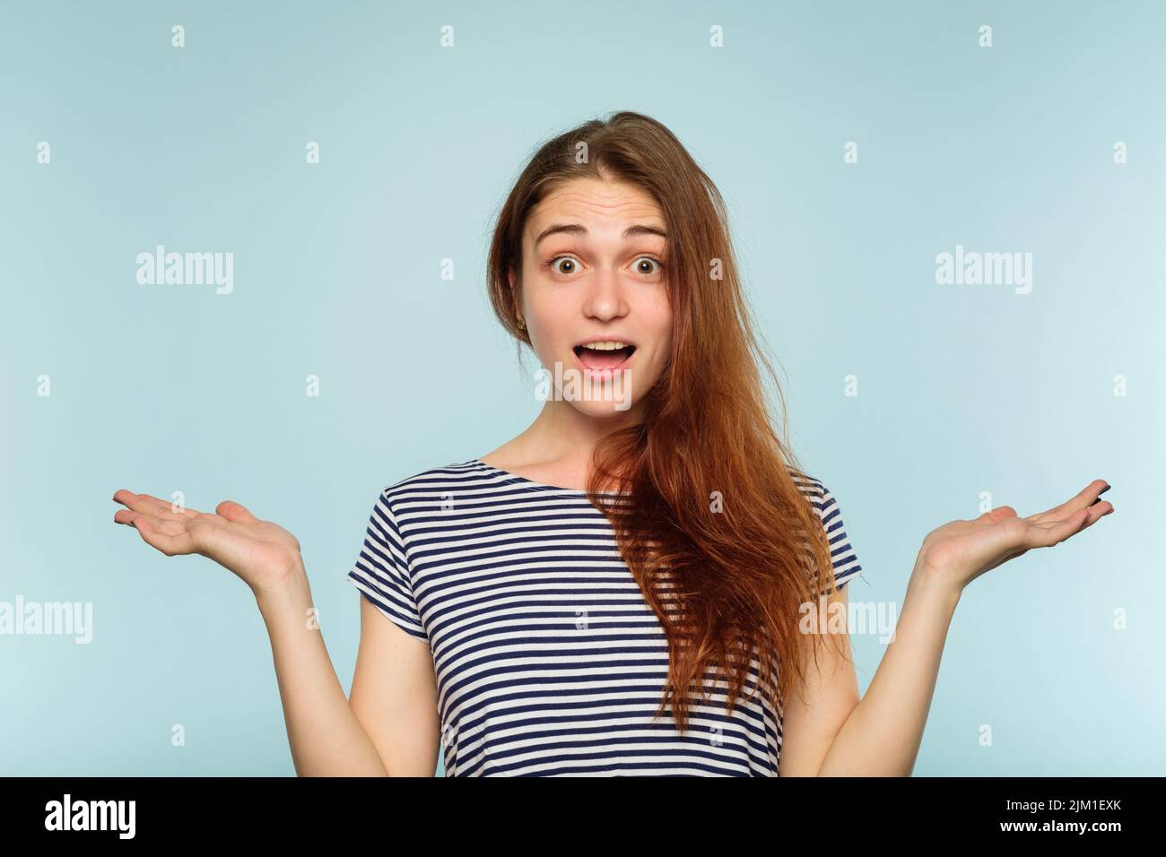 emotion face overwhelmed shocked perplexed woman Stock Photo - Alamy