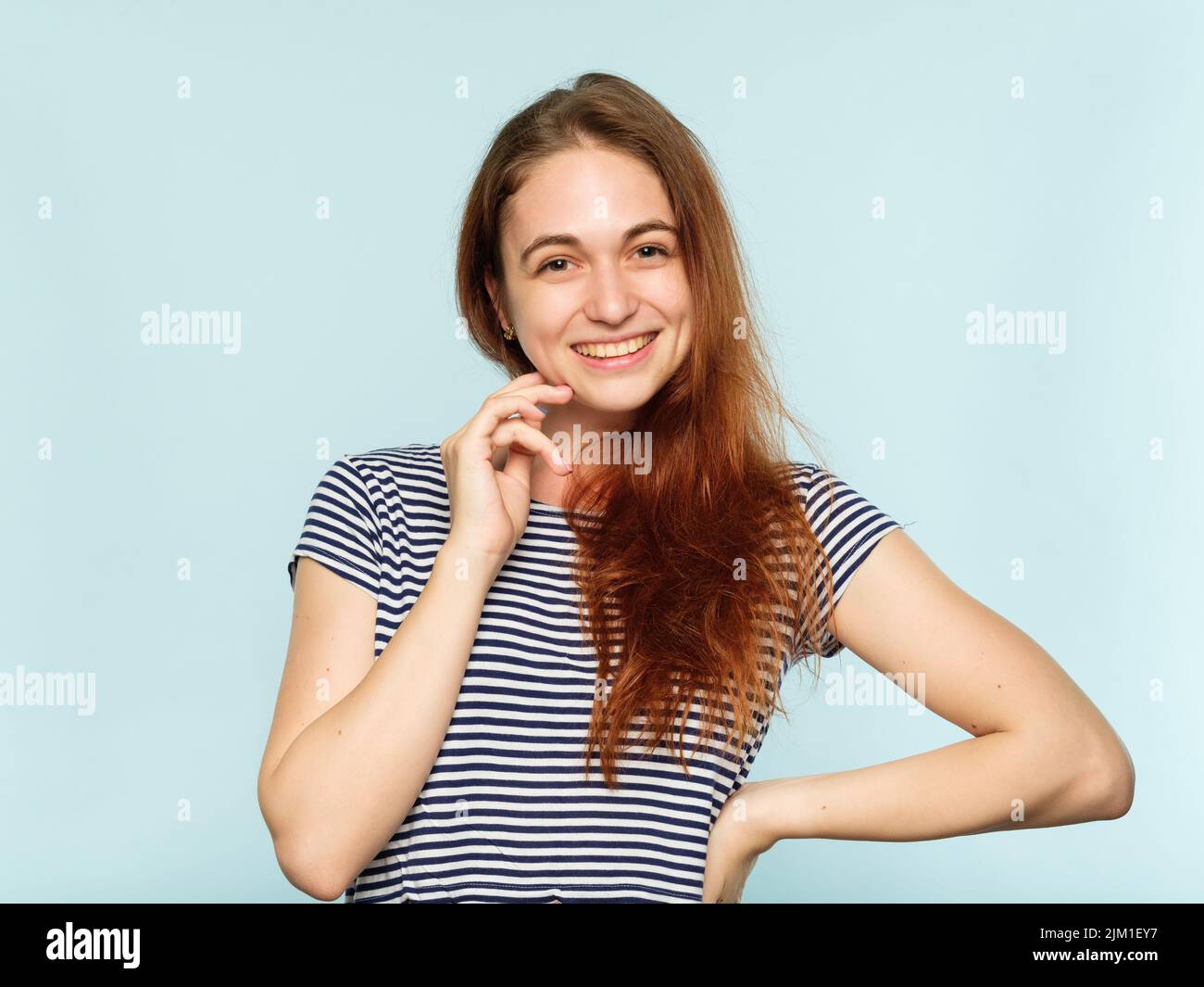 emotion face smiling woman pleased happy Stock Photo - Alamy