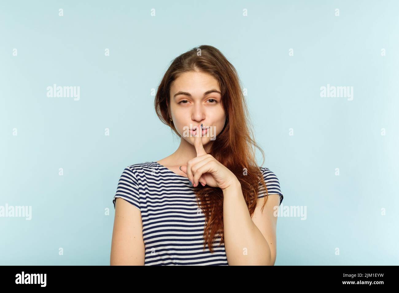 Finger on lips shush hi-res stock photography and images - Alamy