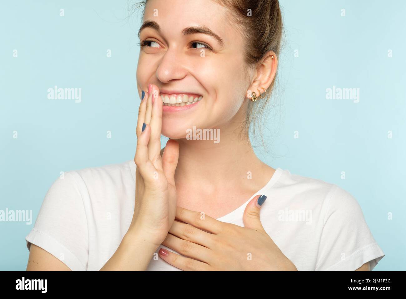 emotion face smiling woman pleased self satisfied Stock Photo - Alamy