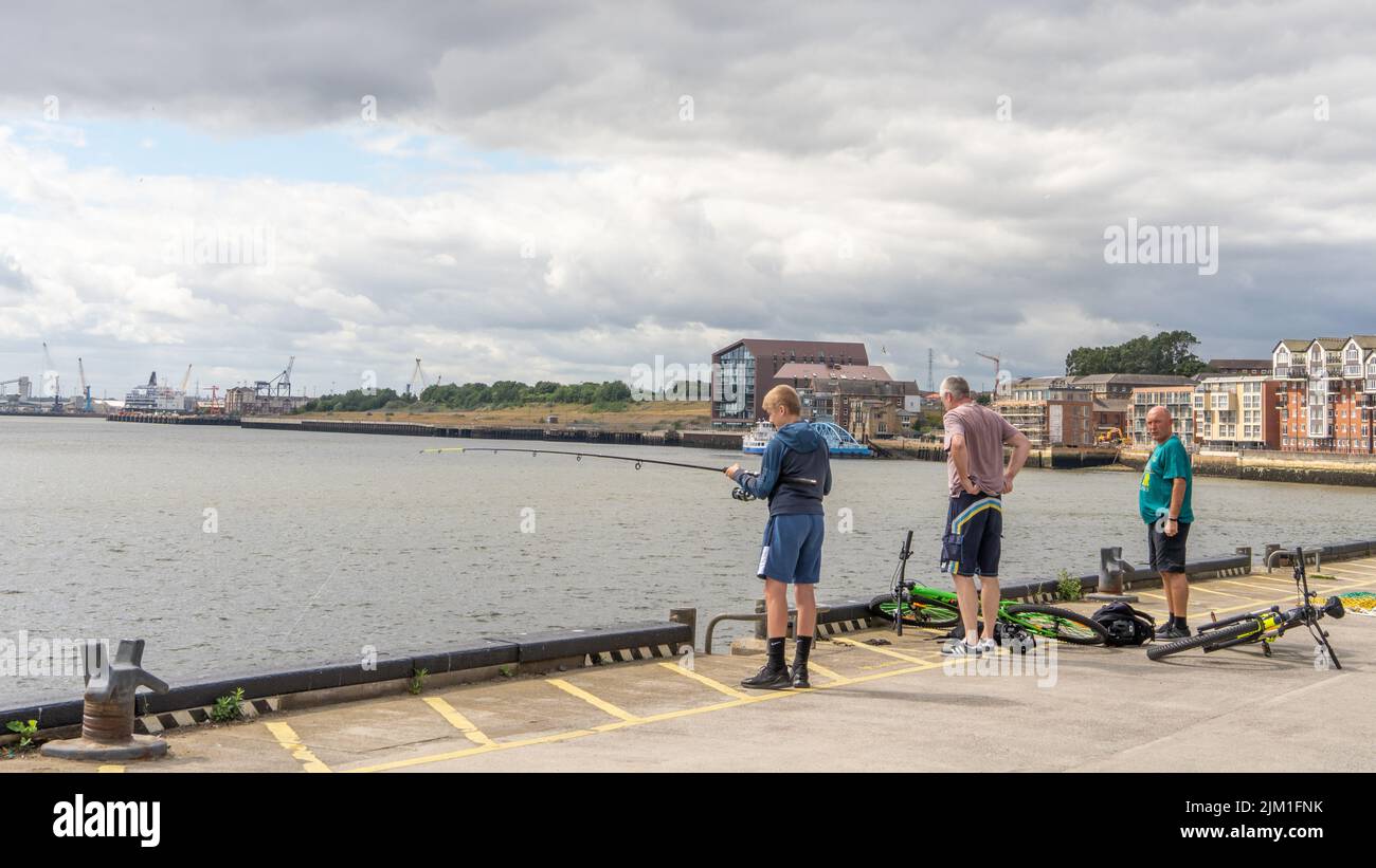 People fishing in the River Tyne off the Fish Quay in North Shields ...