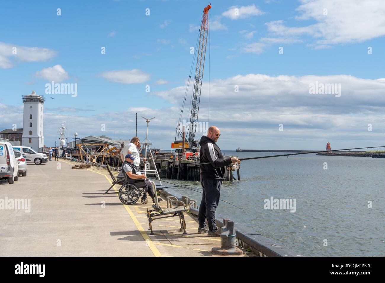 People fishing in the River Tyne off the Fish Quay in North Shields ...
