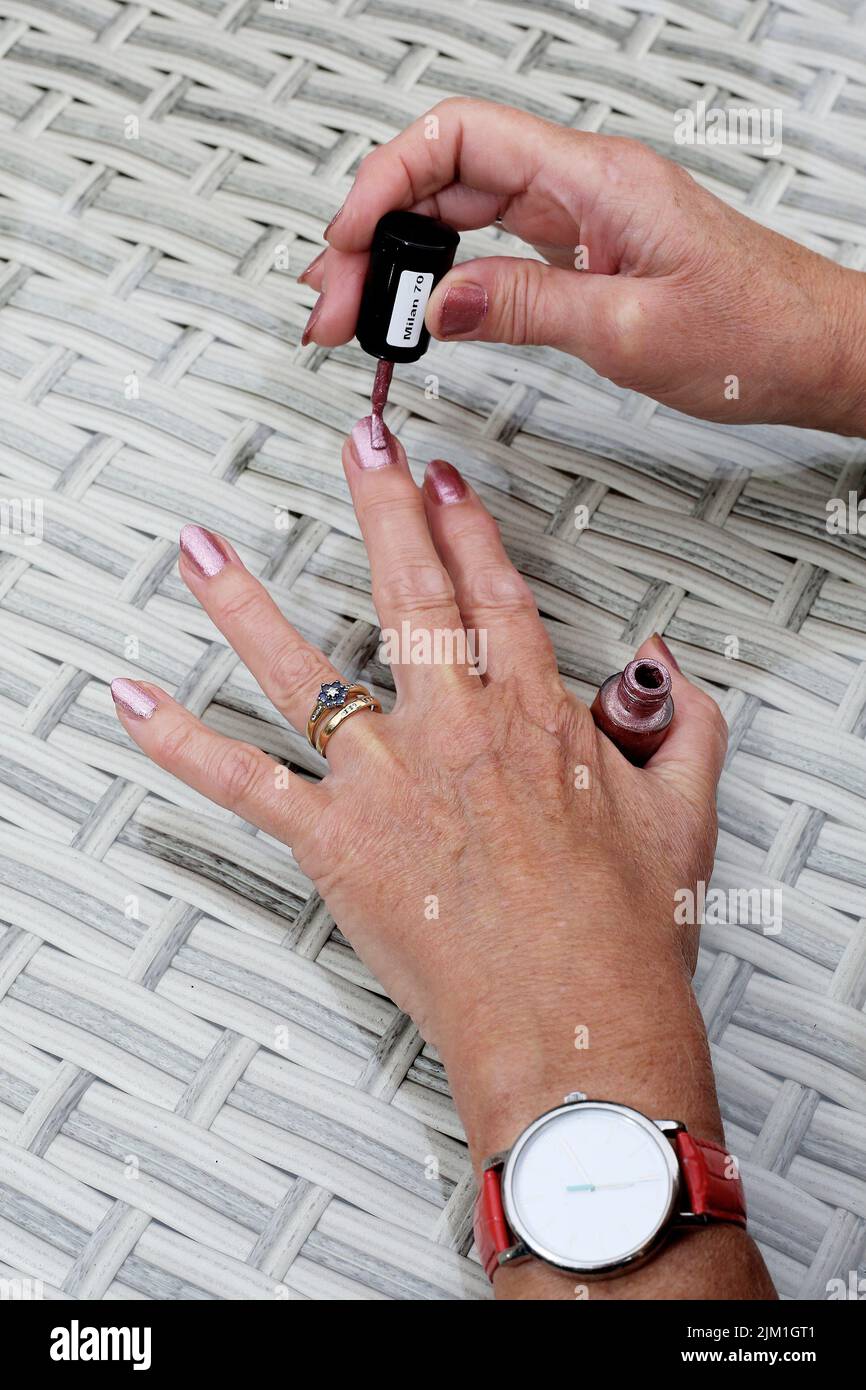 Red nails on chest hi-res stock photography and images - Alamy
