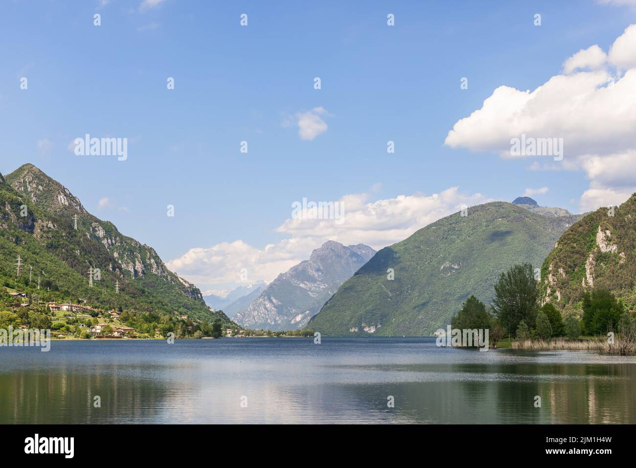 Light summer haze from evaporation over the waters of an alpine lake ...
