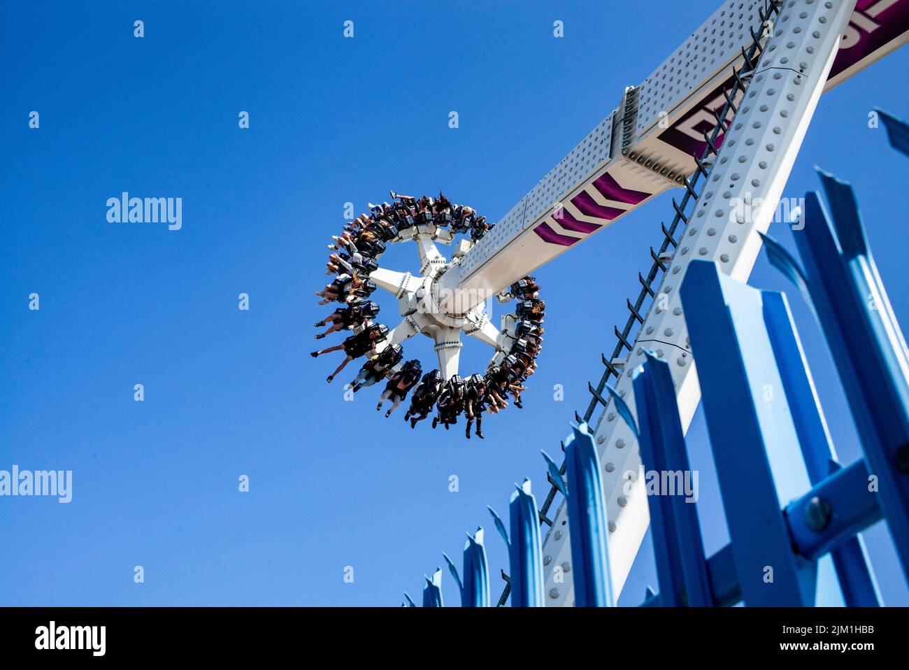 People having a ride on the Axis danger ride at Adventure Island ...