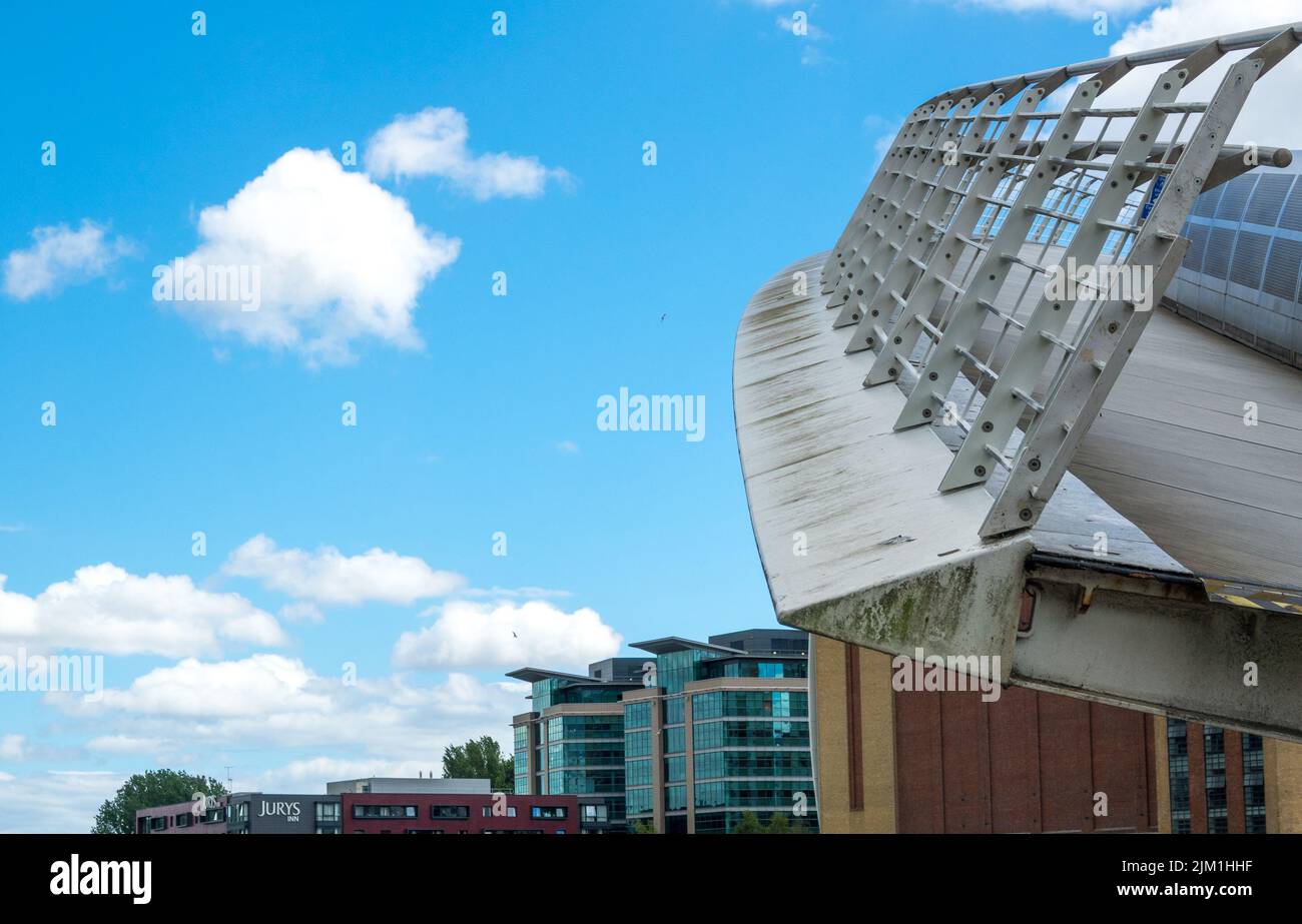 Gateshead Millenium Bridge, Newcastle, being raised over the River Tyne ...