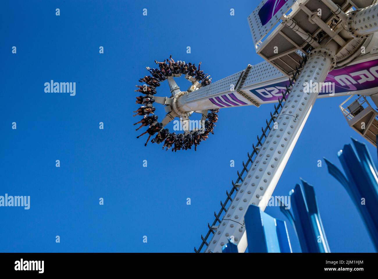 People having a ride on the Axis danger ride at Adventure Island ...