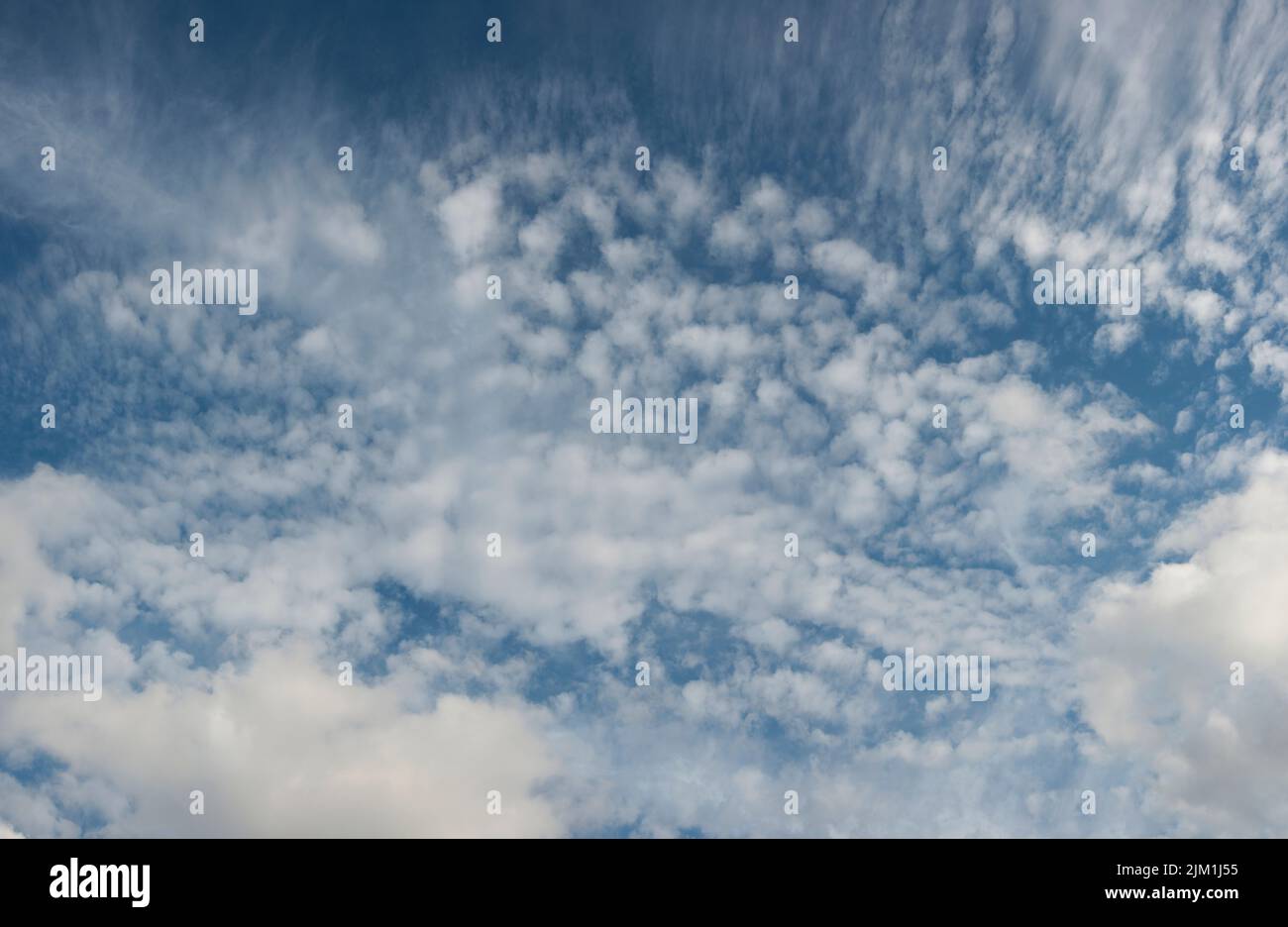 A mix of cloud types at various altitudes Stock Photo - Alamy