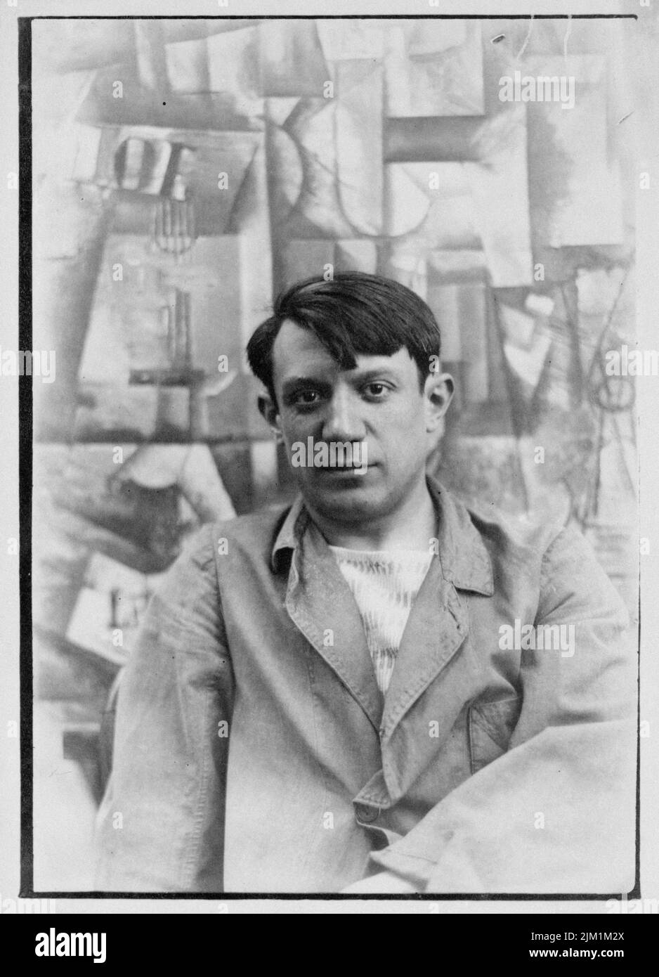 Pablo Picasso with his painting "The Aficionado" in the summer of 1912 ...