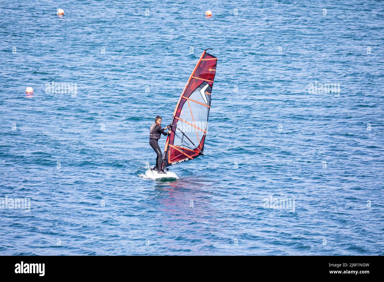 Wind surfer and a boat hi-res stock photography and images - Alamy
