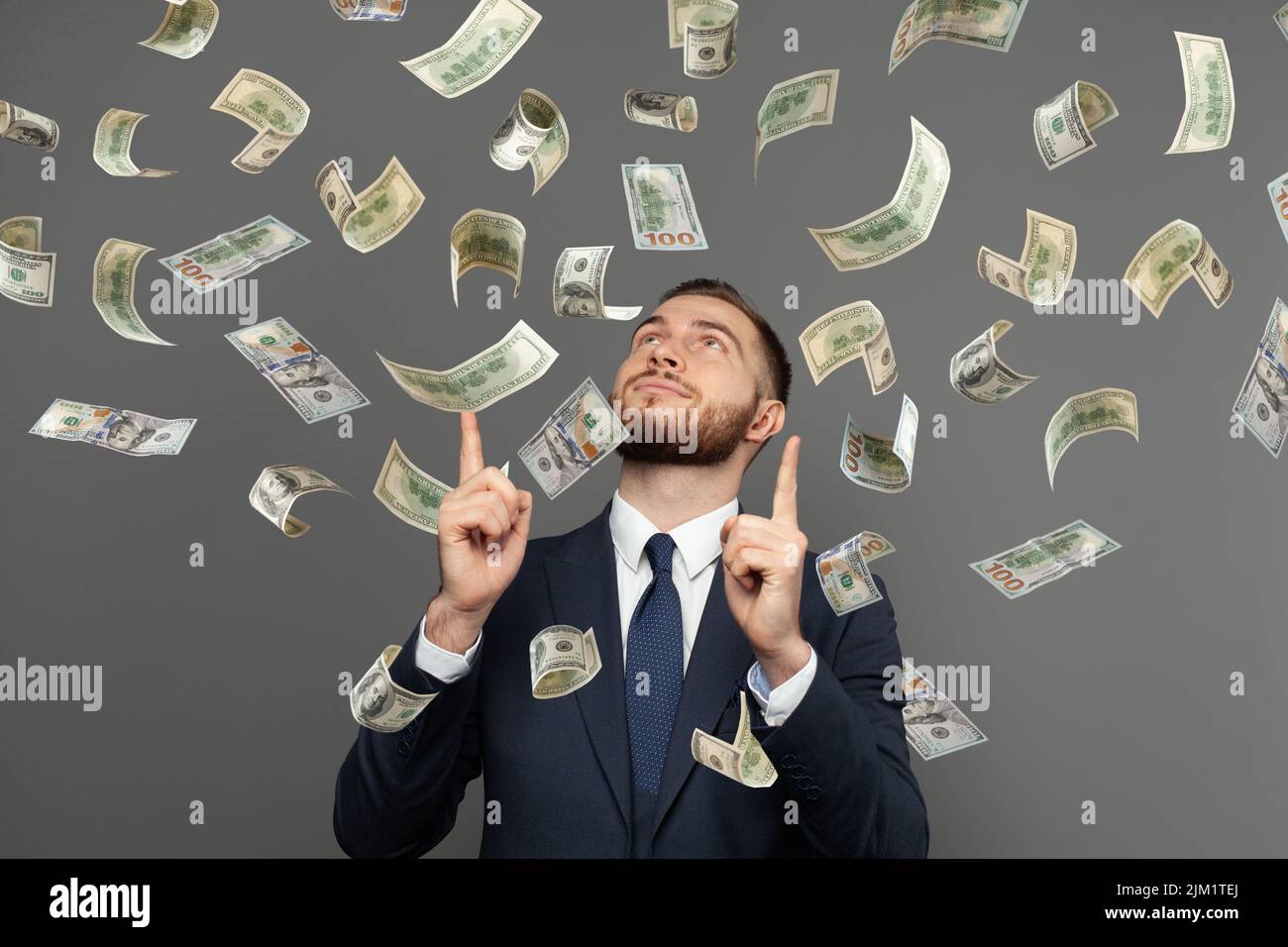 Happy man money rain hi-res stock photography and images - Alamy
