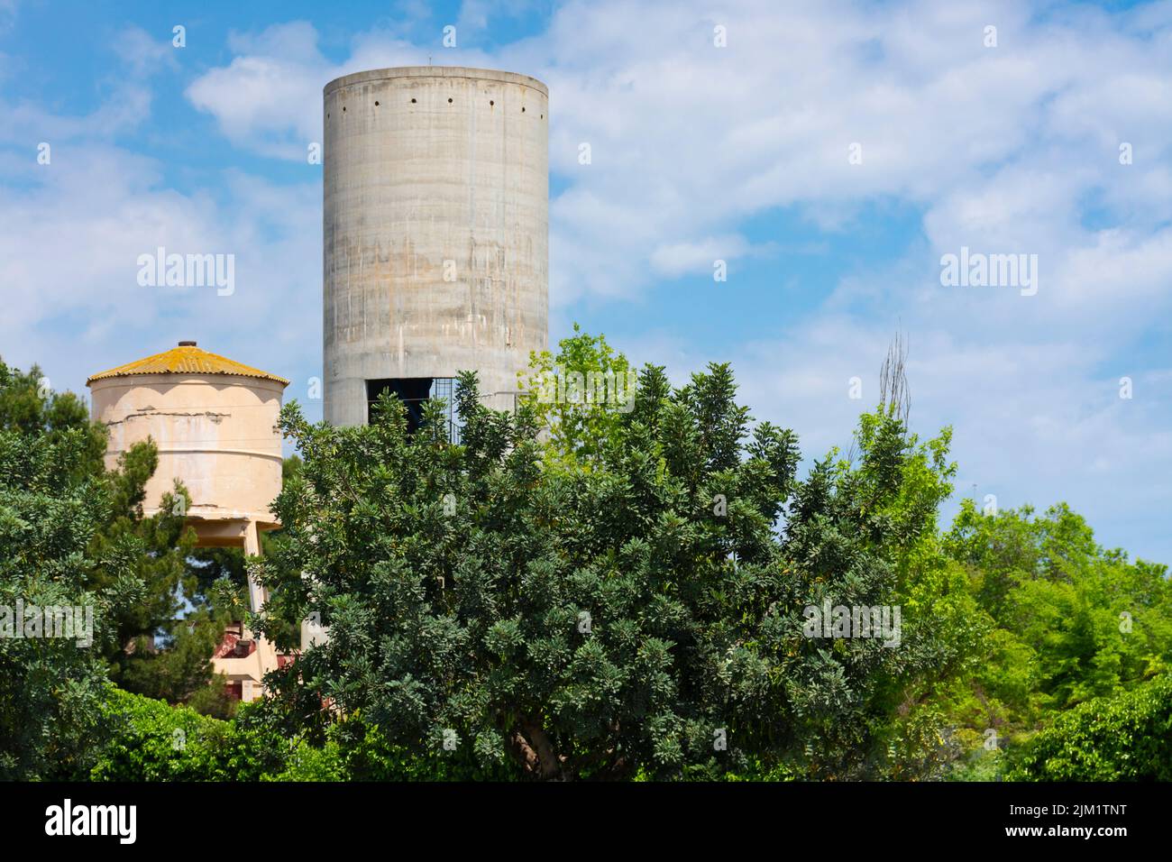 Old small water tank in ruins, unused for being obsolete for the city ...