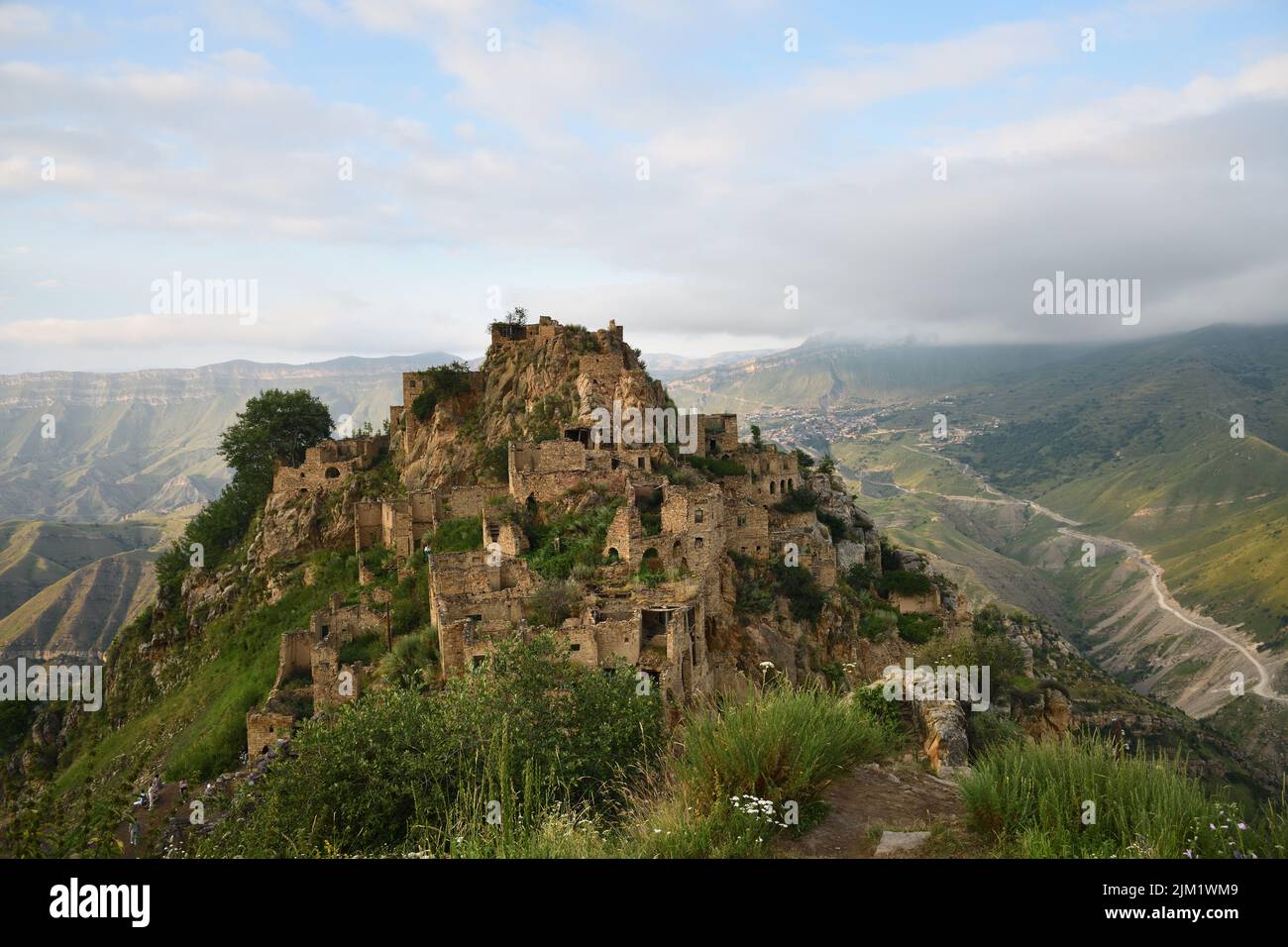 Ancient village Gamsutl on rock on background of mountains. Amazing ...