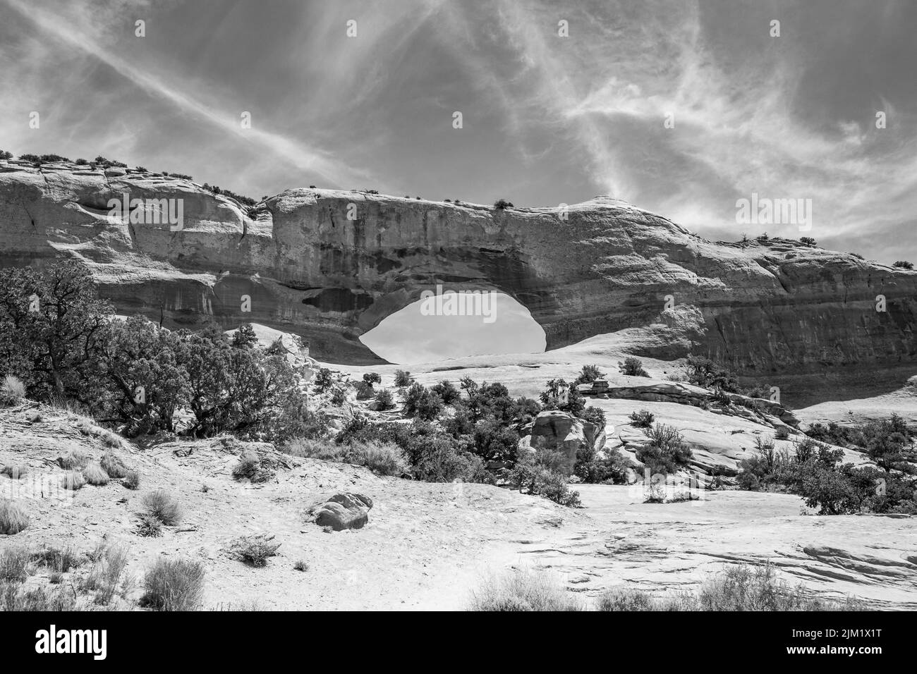 Wilson Arch in a semi desert landscape in Moab Utah Stock Photo - Alamy