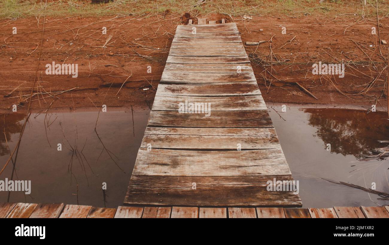 Wooden walkway across lake hi-res stock photography and images - Alamy