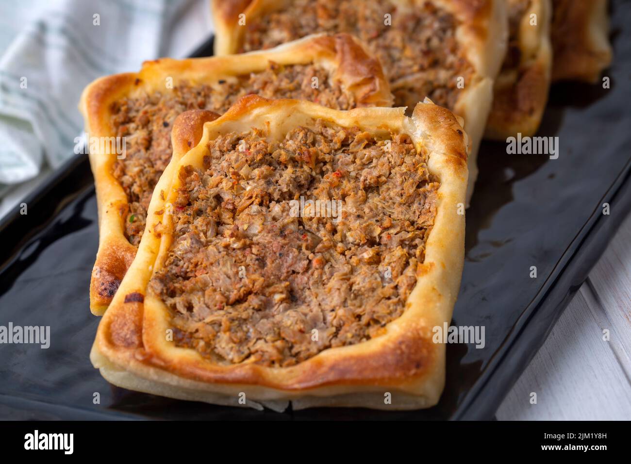 Traditional delicious Turkish foods; Kaytaz pastry with minced meat of ...